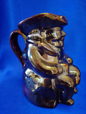 Porcelain & Ceramic - An extremely rare brown / bronze luster Toby jug ...