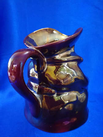 Porcelain & Ceramic - An extremely rare brown / bronze luster Toby jug ...