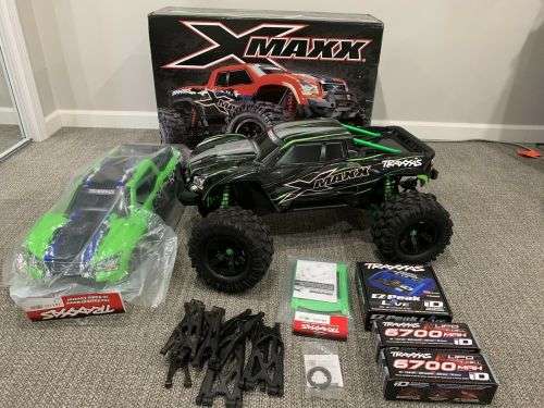 Trucks & Tanks - Traxxas X-Maxx 8S Monster Truck - Green Charger And ...