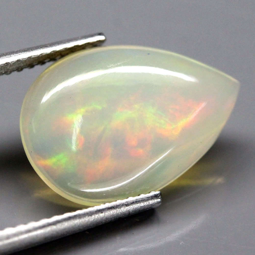 Opal - 2.46Ct. Opal Oval Cabochon Multi Colours Glittering Rainbow 3D! Ethiopian Natural for ...