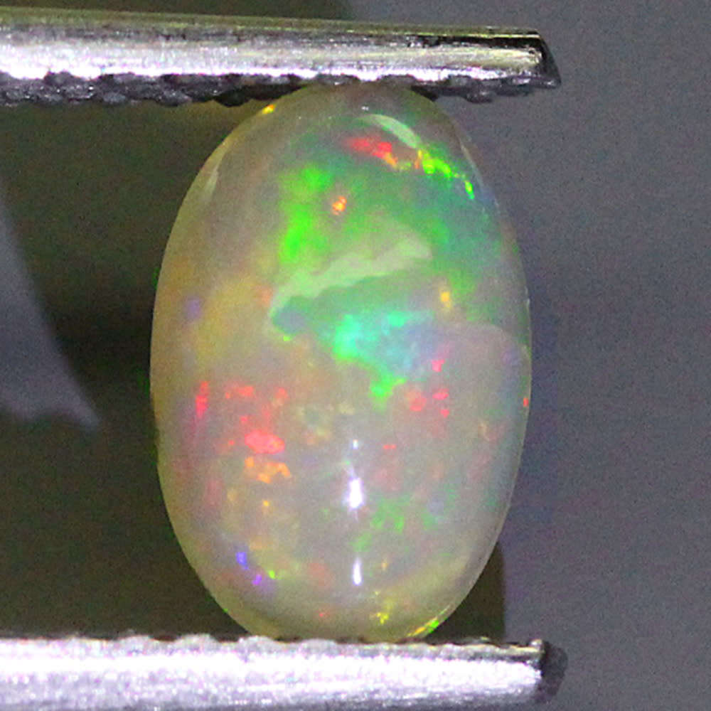 Opal - 0.60Ct. Opal Oval Cabochon Multi Colours Glittering Rainbow 3D! Ethiopian Natural for ...