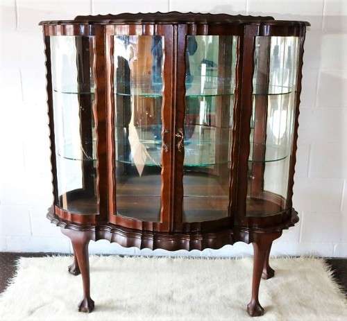 Cabinets - A beautiful vintage "curved glass" ball and claw display ...