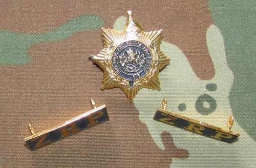 International Badges & Insignia - Zimbabwe Police Cap Badge and ...