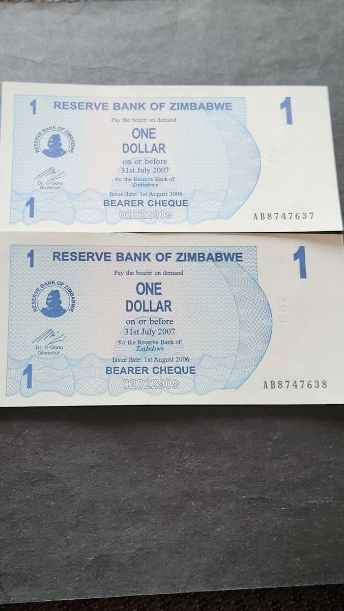 Africa - 2 x Reserve Bank of Zimbabwe One Dollar Bearer Cheque issue ...