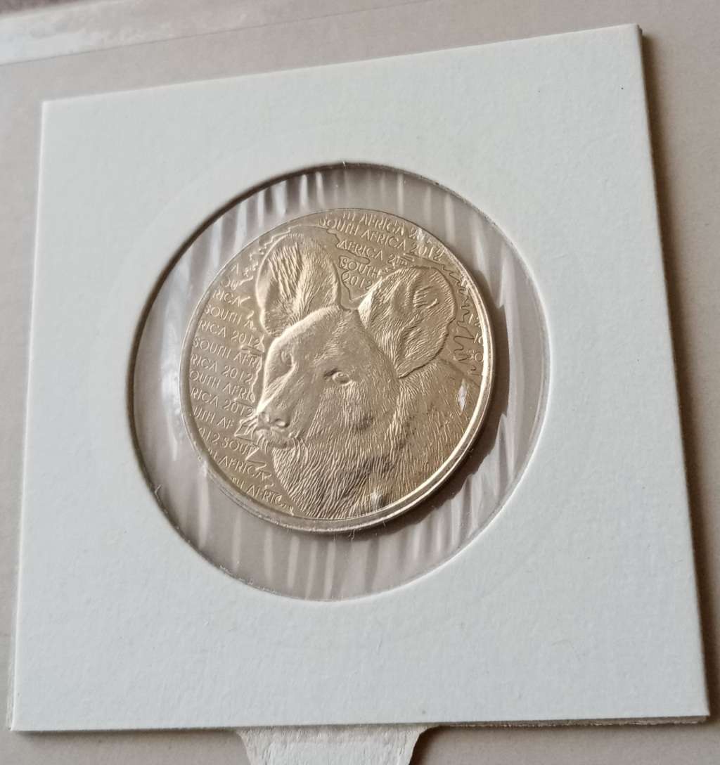 Tokens - 2012 Coin World token (Spotted Hyena) was sold for R40.00 on 3 ...