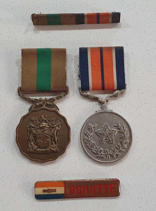 SADF & SANDF - Two SADF medals with name tag as per photo. was listed ...