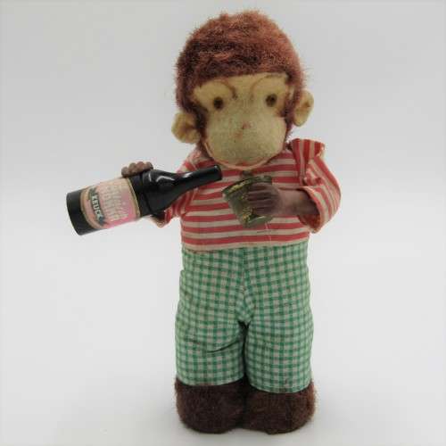 Vintage Toys - Vintage mechanical monkey toy - pouring a Vintage ...