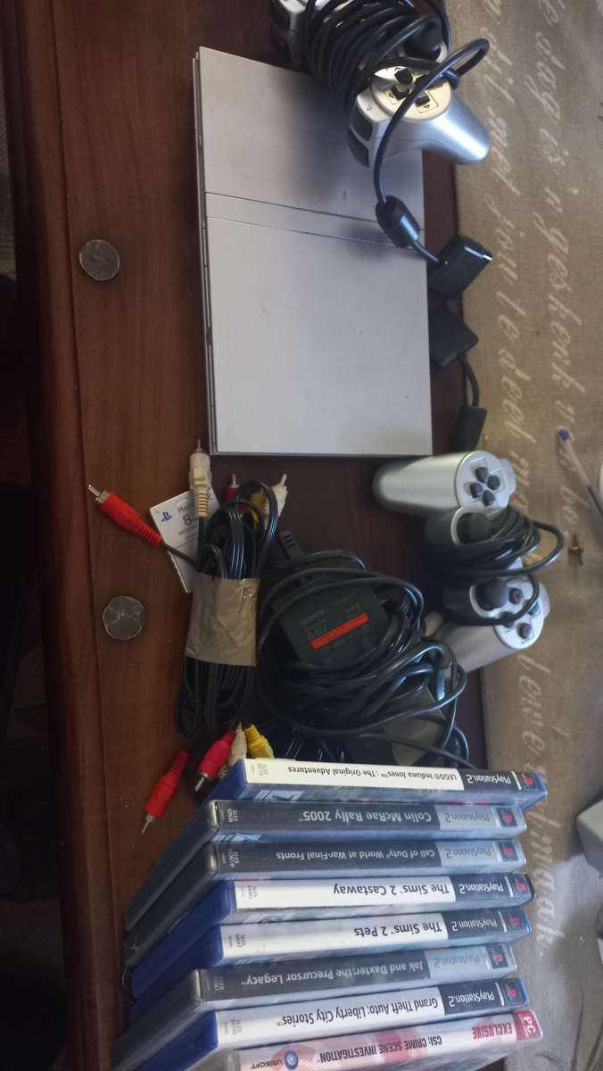 PlayStation - PS2 console with 8 games and 8mb card for sale in ...