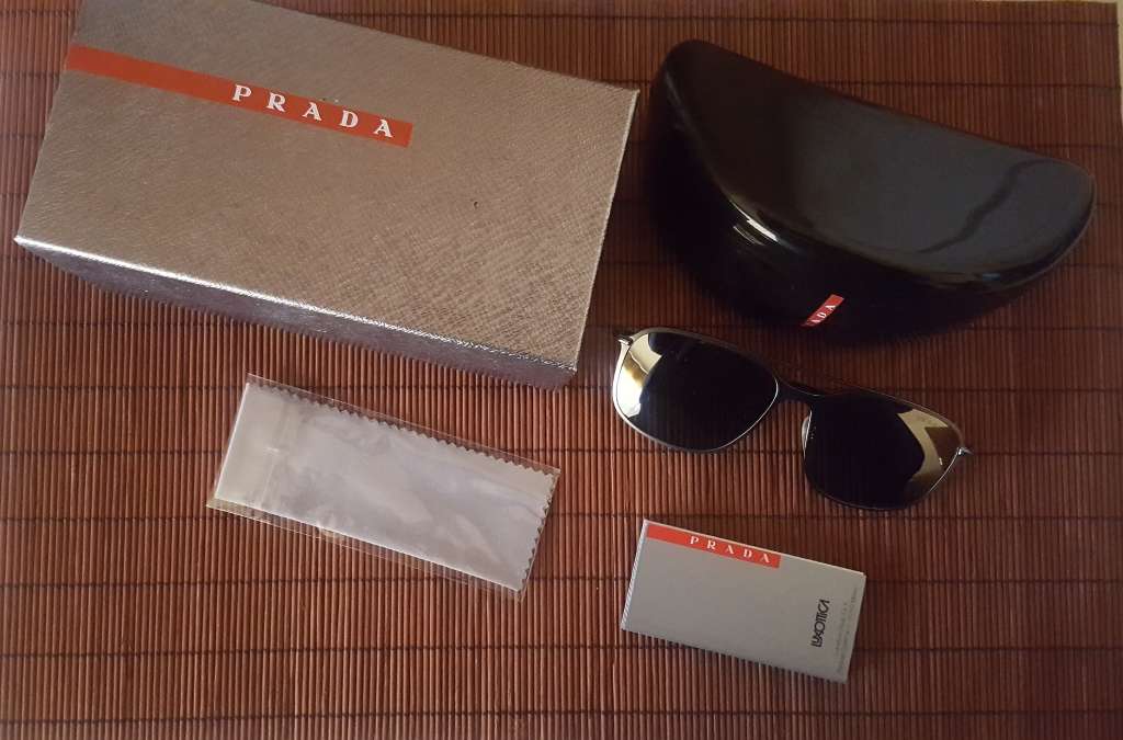 Sunglasses - ORIGINAL PRADA LINEAR ROSSI GUN METAL SUNGLASSES was sold ...