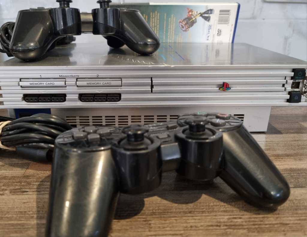 PlayStation - PS2 Console + 2 Controllers + Games was sold for 1,500.00 ...