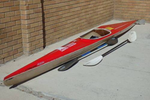 Kayaks & Canoes - An awesome K1 racing kayak with two paddles, splash ...