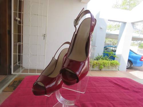 Heels - Beautiful pair of dark red high heel shoes with open toes.By ...
